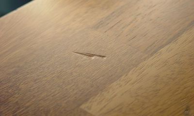 Small Dent on a Real Wood Surface